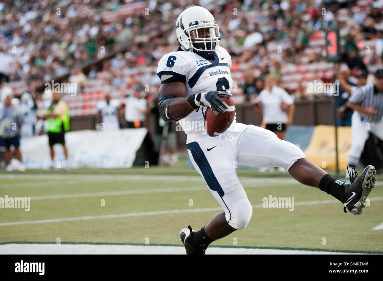 Utah State running back Robert Turbin #6 scores during first half ...
