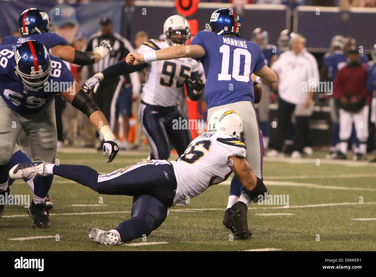 New York Giants #10 quarterback Eli Manning tries to make a brake but ...