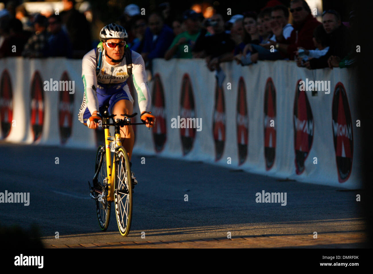 A parapalegic racer starts his leg of the bike with only one at the ...