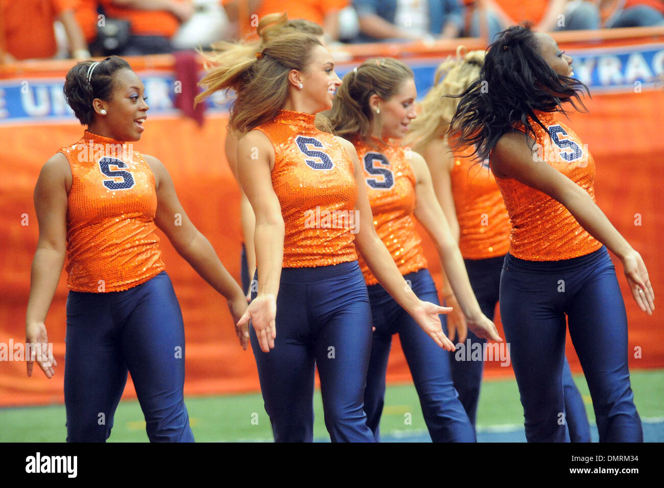 Members of the Syracuse Orange dance team perform in the end-zone ...