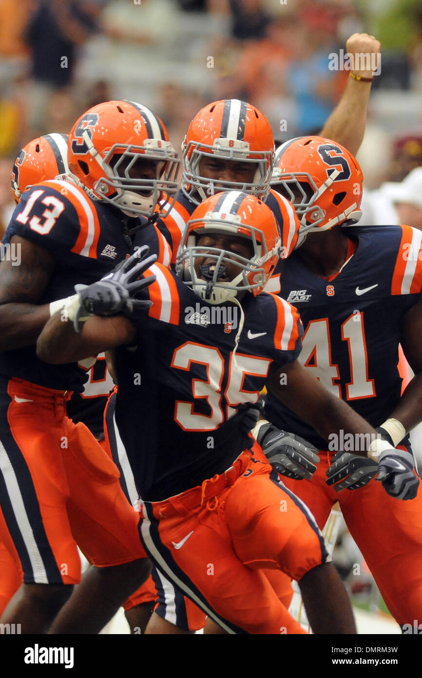 Syracuse's Mike Holmes ,35, celebrates after the interception in the ...