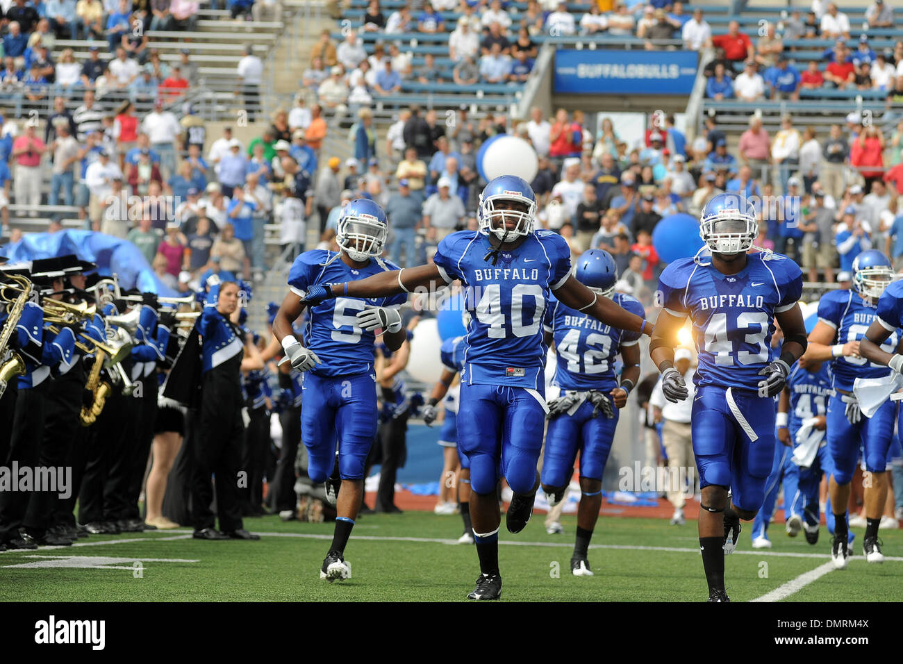 University of Buffalo Bull Steven Means pumps up the crowd as the team ...