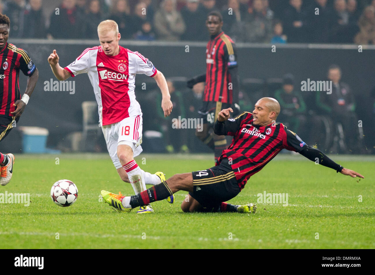 Milan, Italy. 11th Dec, 2013. Davy Klaassen (Ajax), Nigel de Jong ...