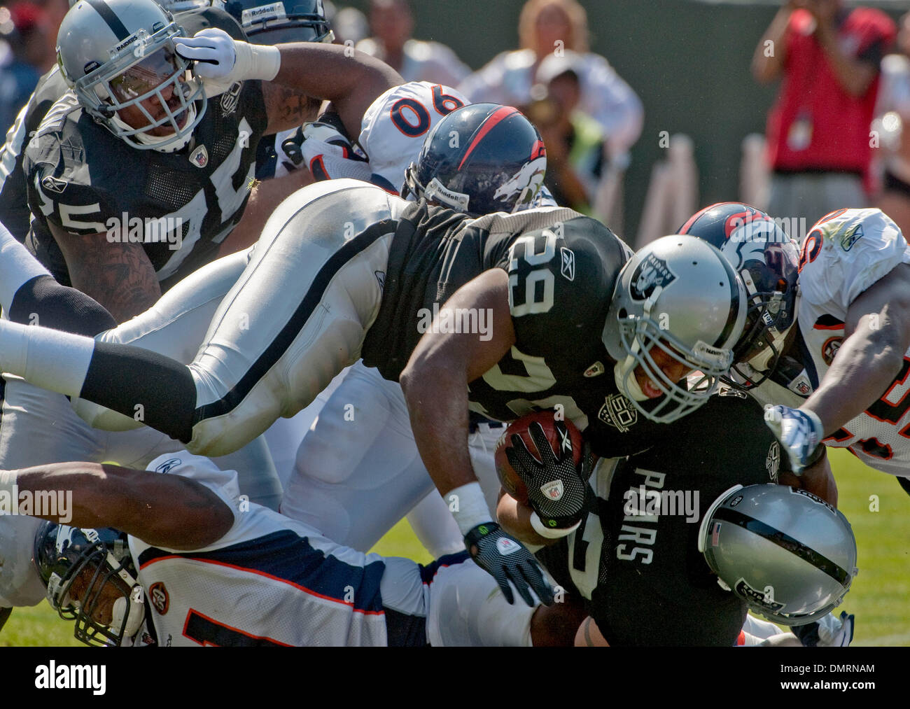 Pile of football players hi-res stock photography and images - Alamy
