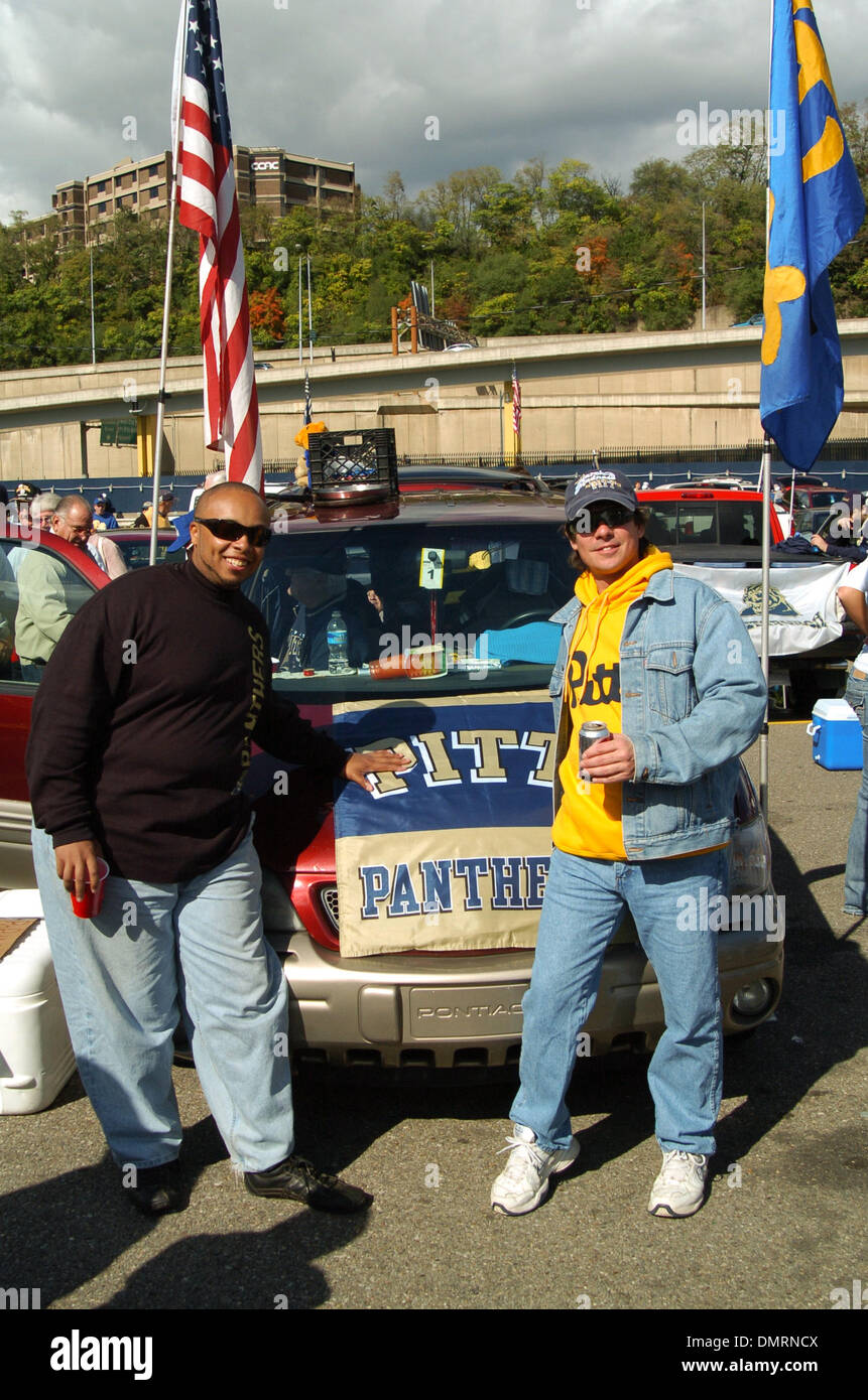 Two Pittsburgh Panthers fans show their team spirit with a tailgate ...