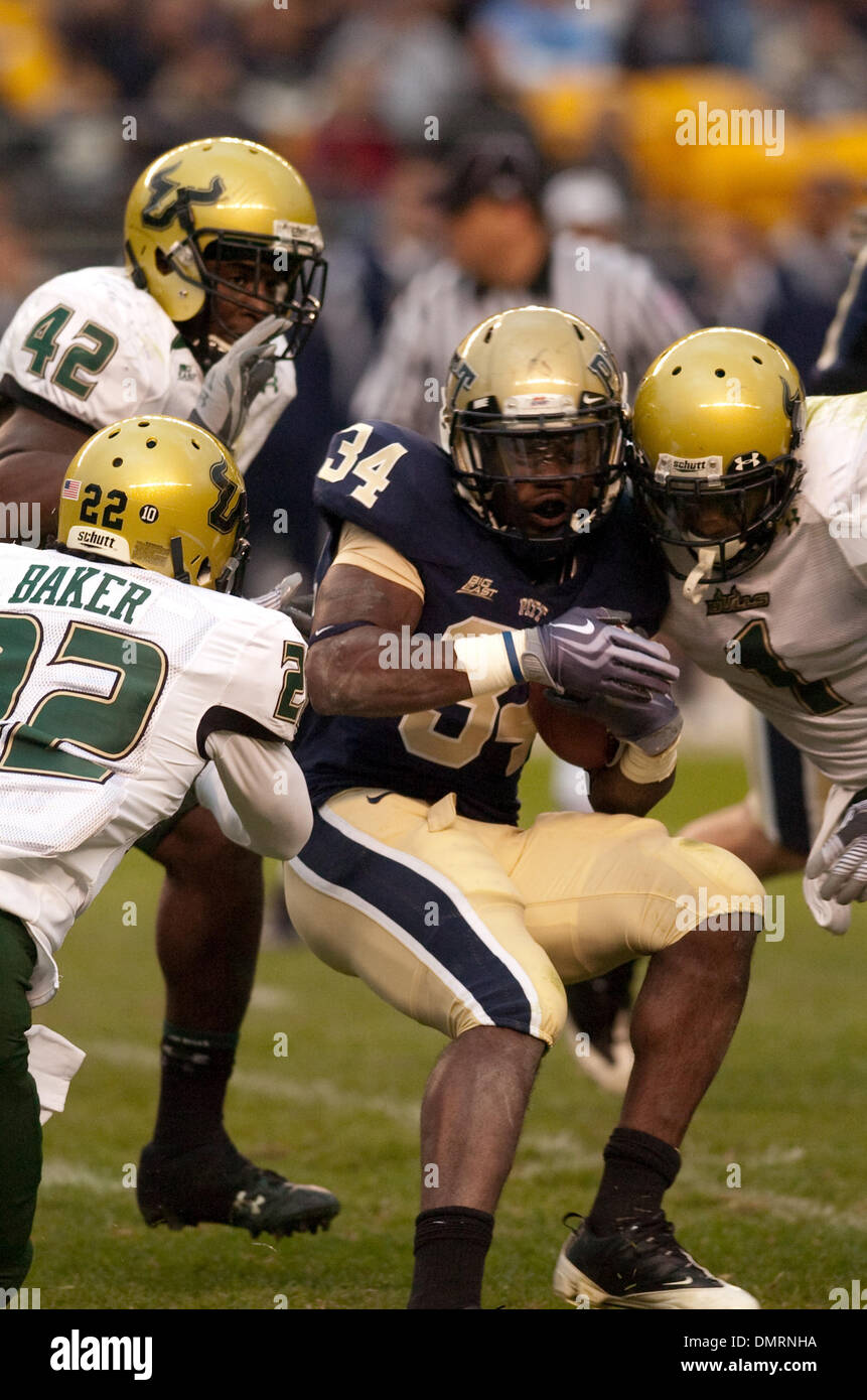 Pittsburgh Panthers running back Ray Graham (34) is tackled by South ...