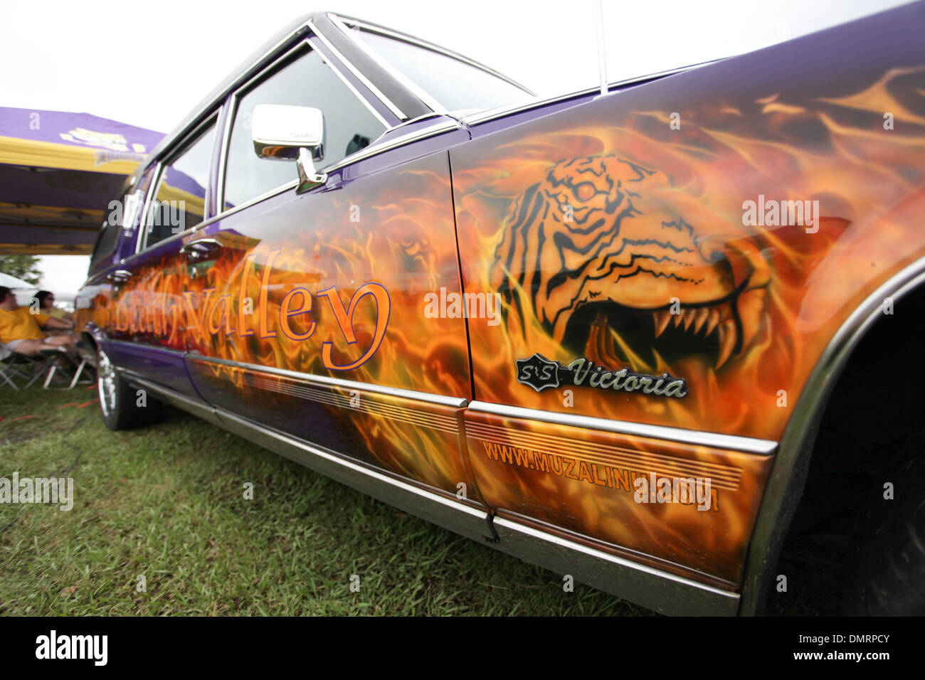 An LSU fan displays his prize car while tailgating during Saturday ...