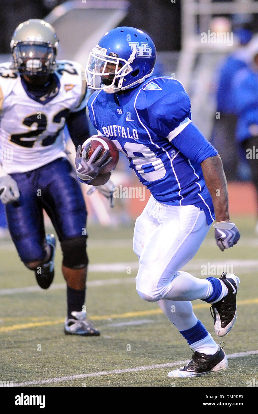 Buffalo running back Mario Henry (28) takes the ball for a couple of ...