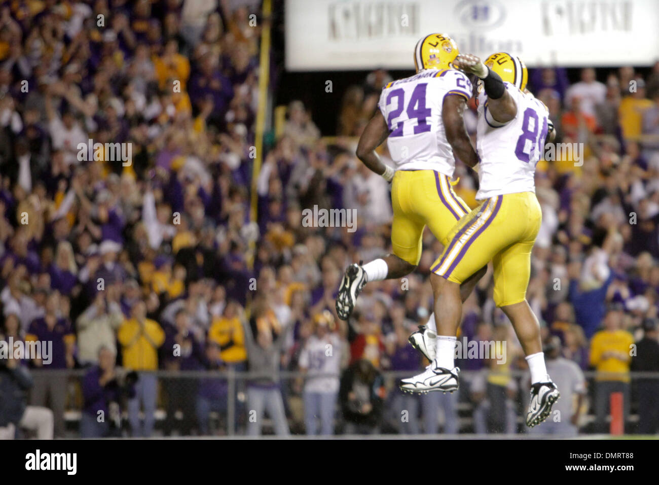 LSU cornerback Harry Coleman (24) and defensive end Rahim Alem (84 ...
