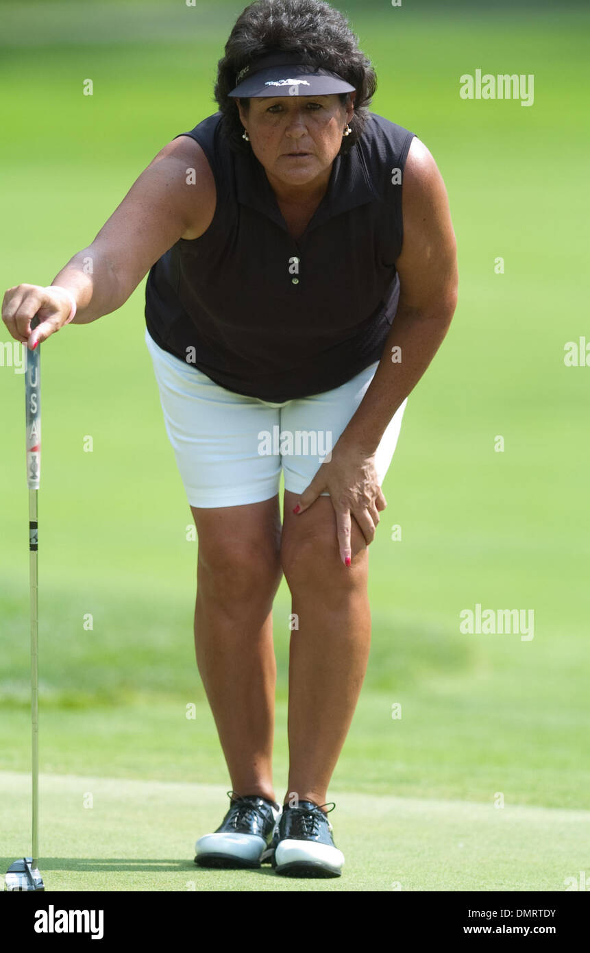 Golfer Nancy Lopez lines up a putt during the 2nd round of the 2010 ...
