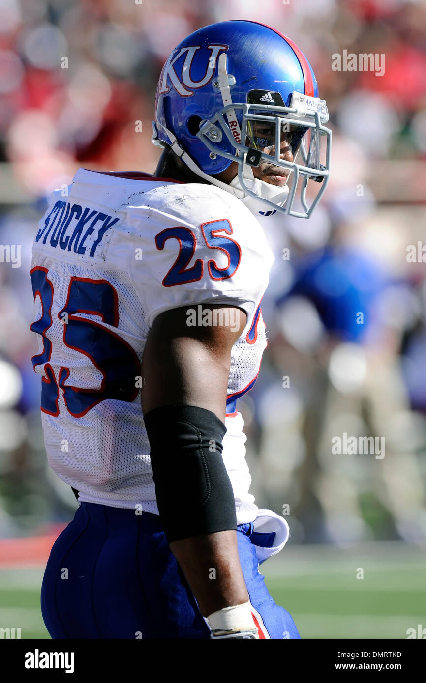 Kansas safety Darrell Stuckey grabs a sack on the day as the Kansas ...