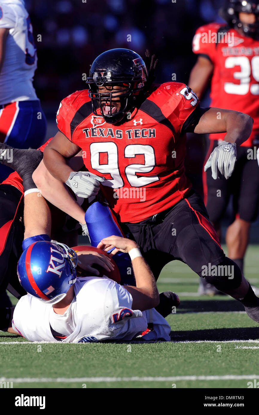 DE Brandon Sharpe makes his 11th sack of the season as the Kansas ...