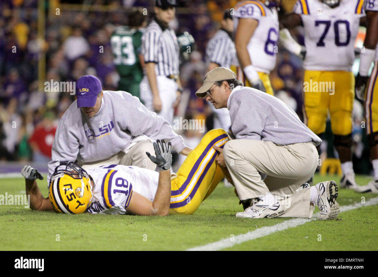 LSU tight end Richard Dixon (18) is injured during the game between the ...