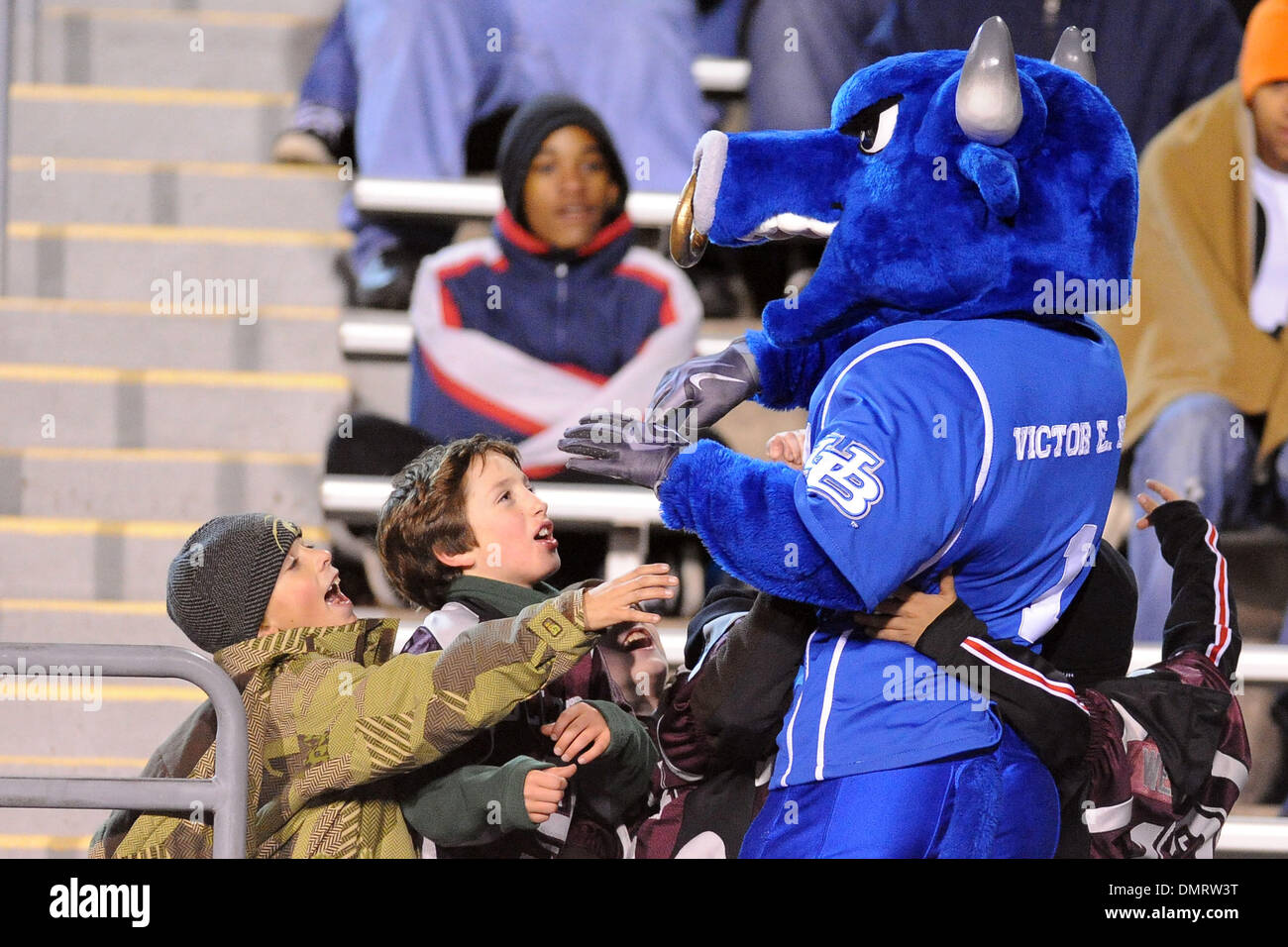 The UB Bull gets the attention of some young fans in the stands in ...