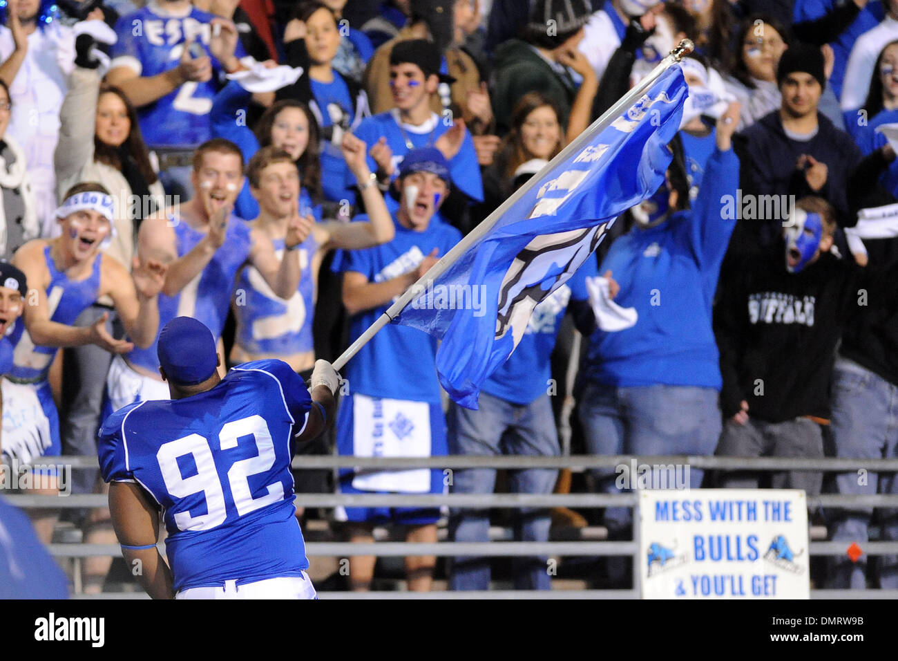 Buffalo defensive lineman Dane Robinson (92) waves a flag in front of ...