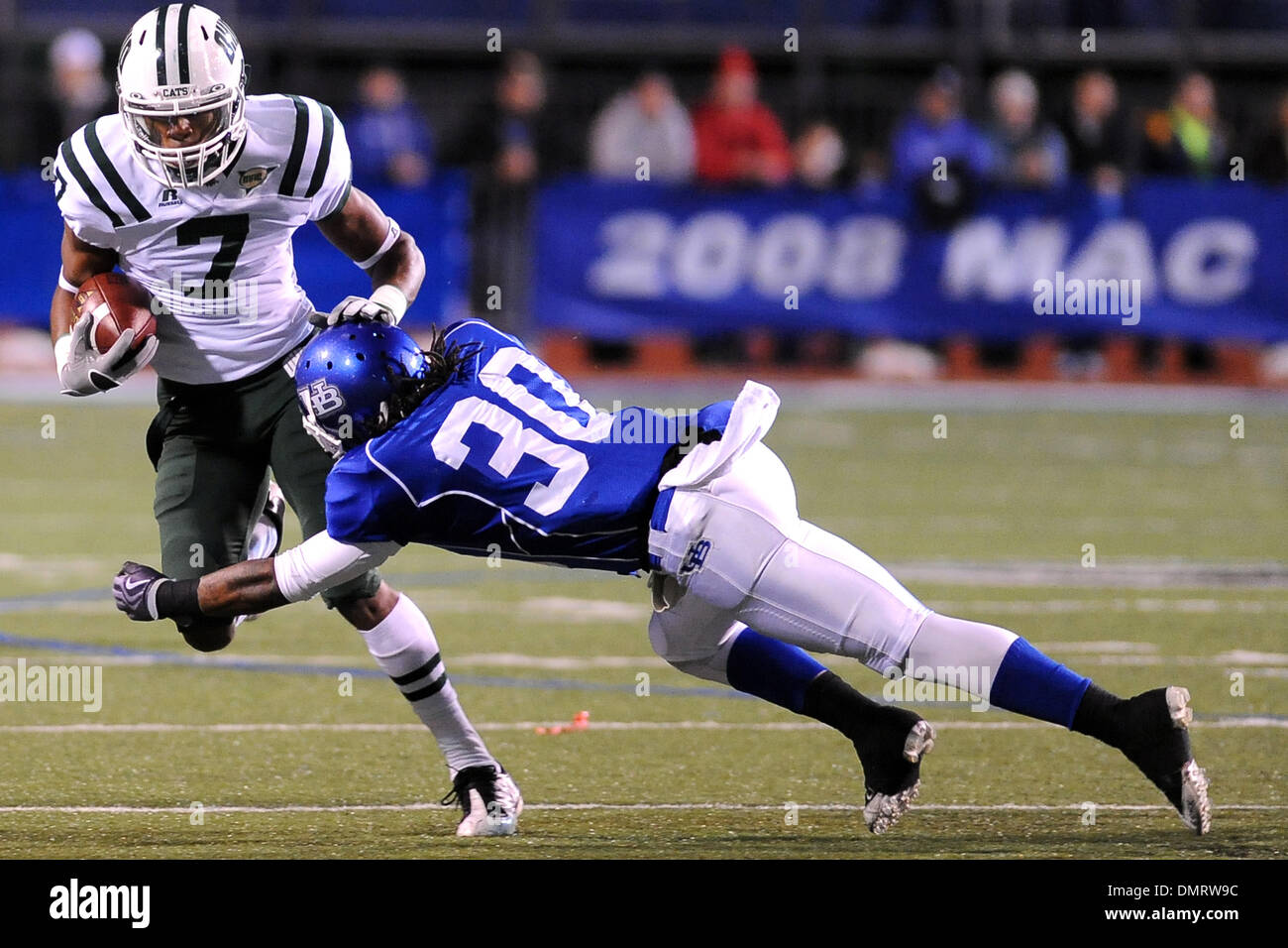 Ohio wide receiver LaVon Brazill (7) stiff arm's Buffalo defensive back ...