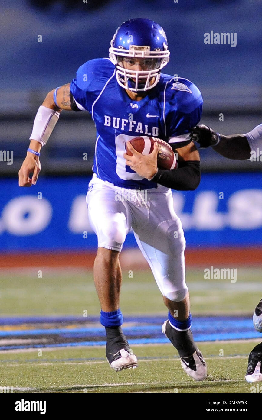Buffalo quarterback Zach Maynard (6) scrambles up field as he tries to ...