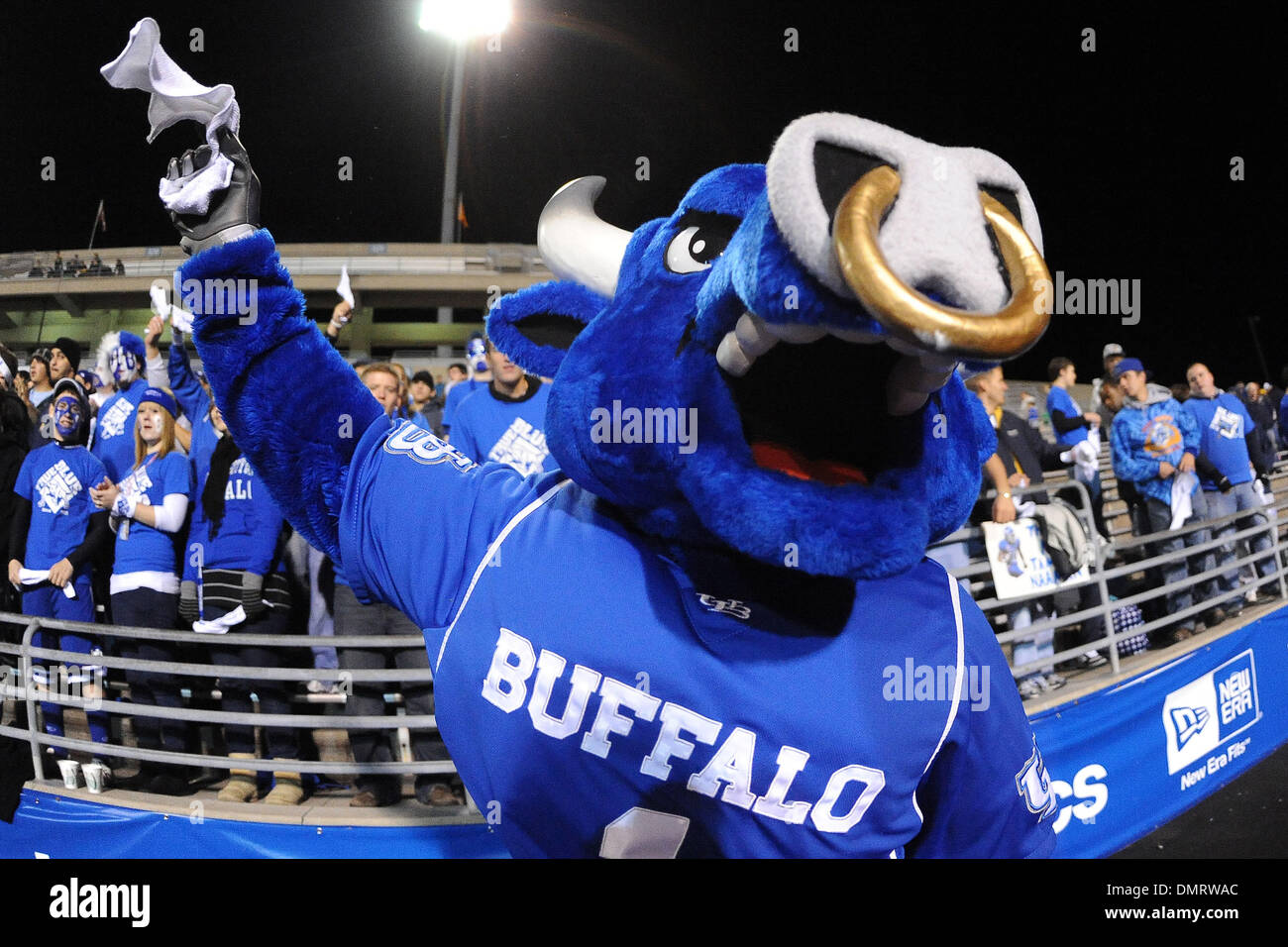 Buffalo mascot Victor E. Bull waves a towel in front of the student ...