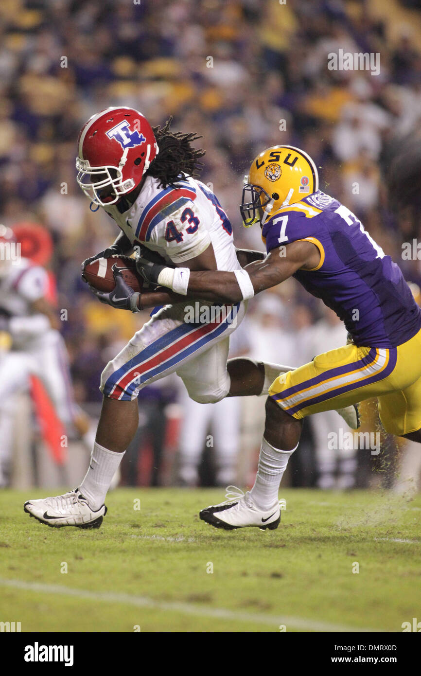 Tech tight end Dustin Mitchell (43) is dragged down by LSU cornder back ...