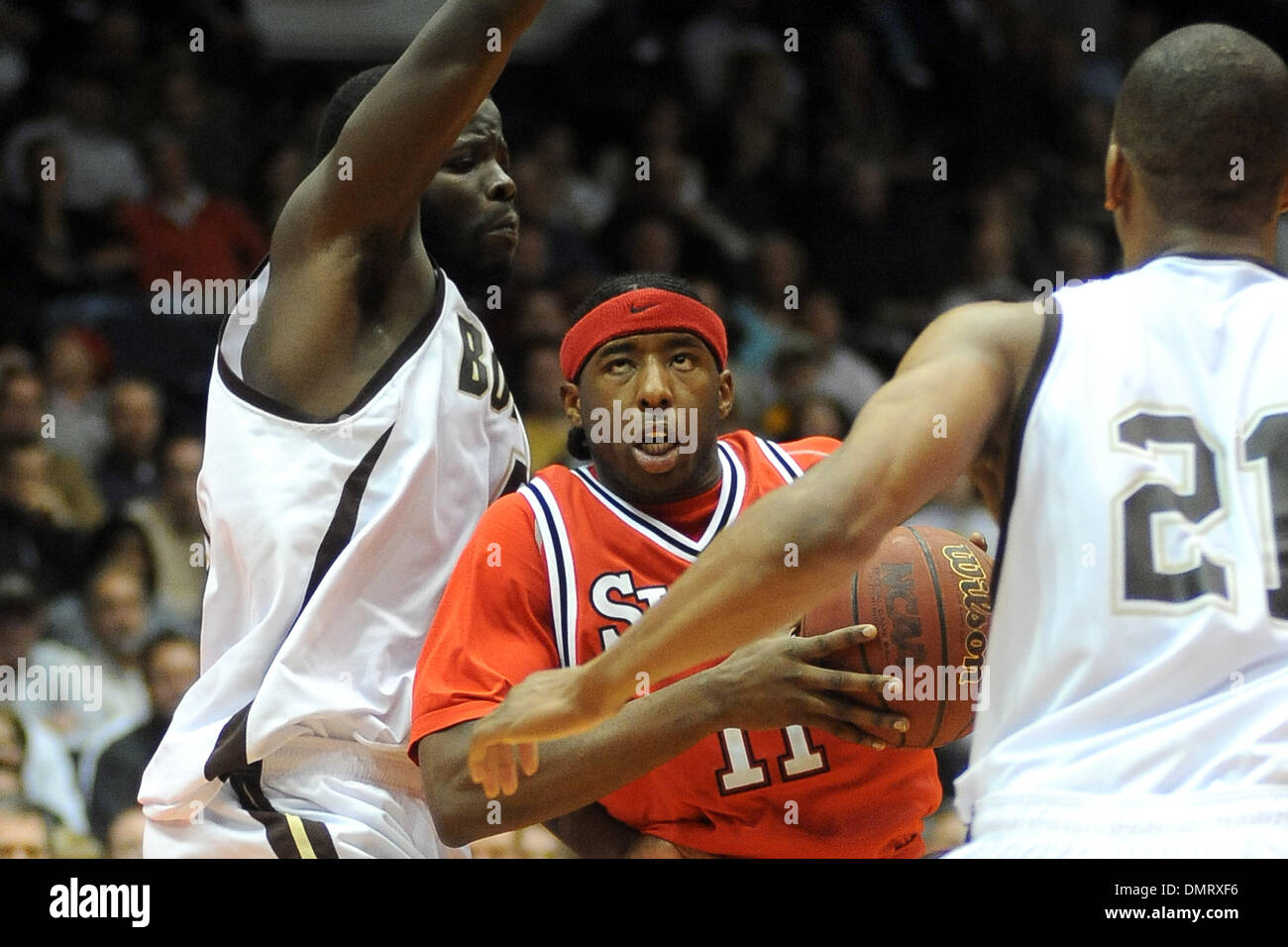 St. John's guard/forward Omari Lawrence (11) drives to the hoop on St ...