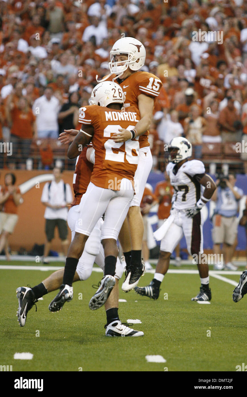 Freshman Texas wide receiver D.J. Monroe (26) celebrates with kicker ...