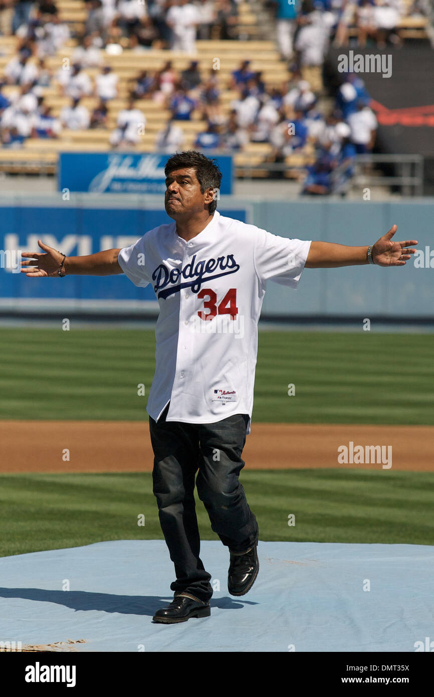 Comedian/Actor George Lopez throwing out the ceremonial first pitch ...