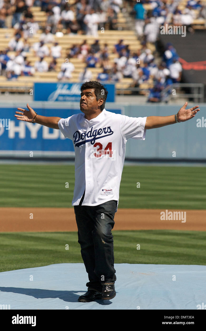 Comedian/Actor George Lopez throwing out the ceremonial first pitch ...