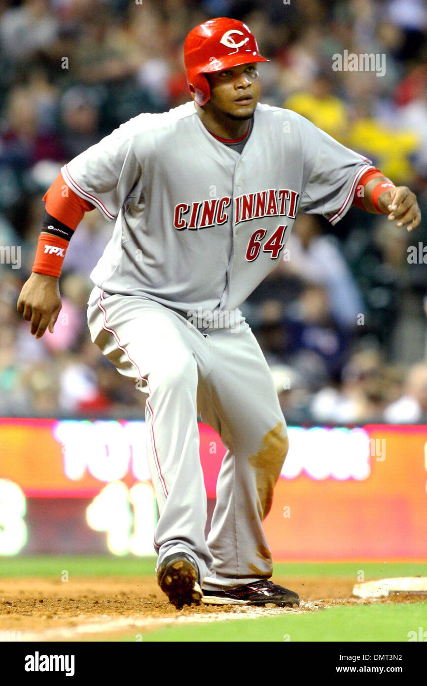 Reds third baseman Juan Francisco (64) lading off of third base in the ...