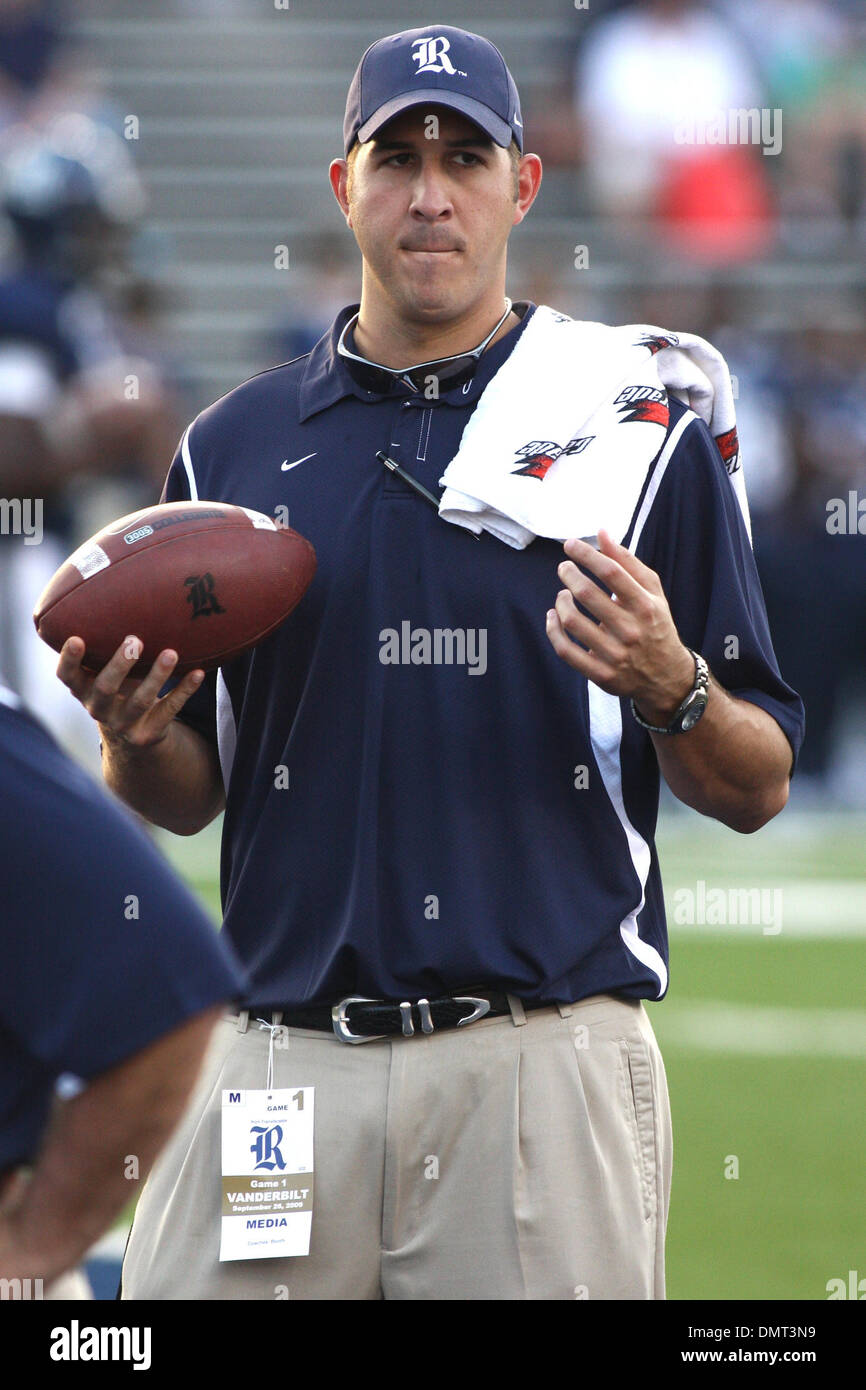 Rice coach overseeing the linemen running drills at Rice Stadium in ...