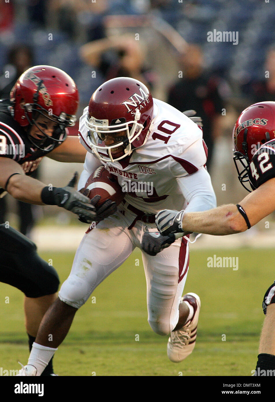 New Mexico Aggies Marcus Anderson is brought down by San Diego State ...