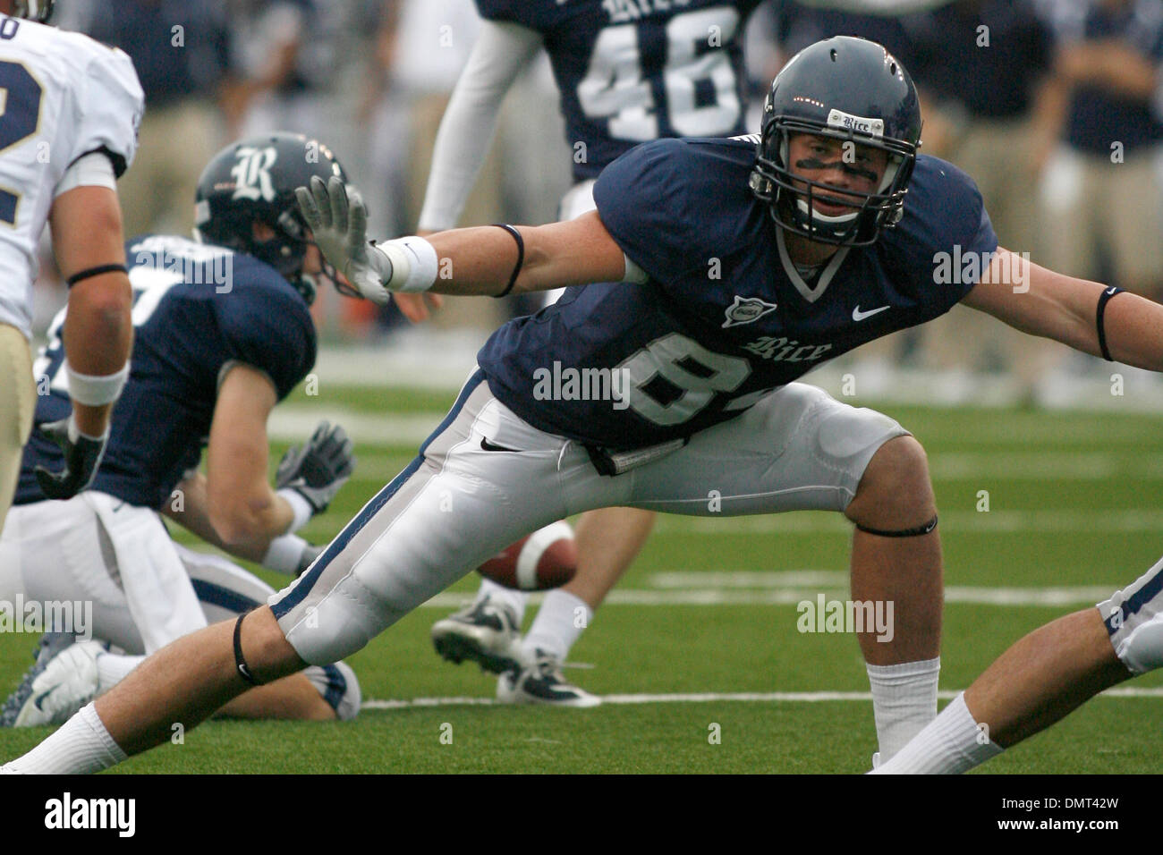 Rice defender protecting the extra point kick. Navy defeated Rice Owls ...