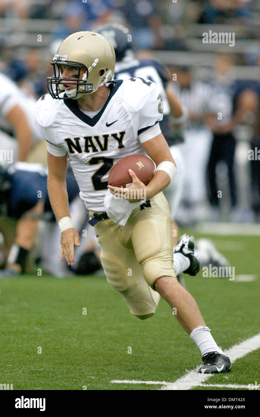 Navy quarterback Kriss Proctor (2) on a quarterback keeper. Navy ...
