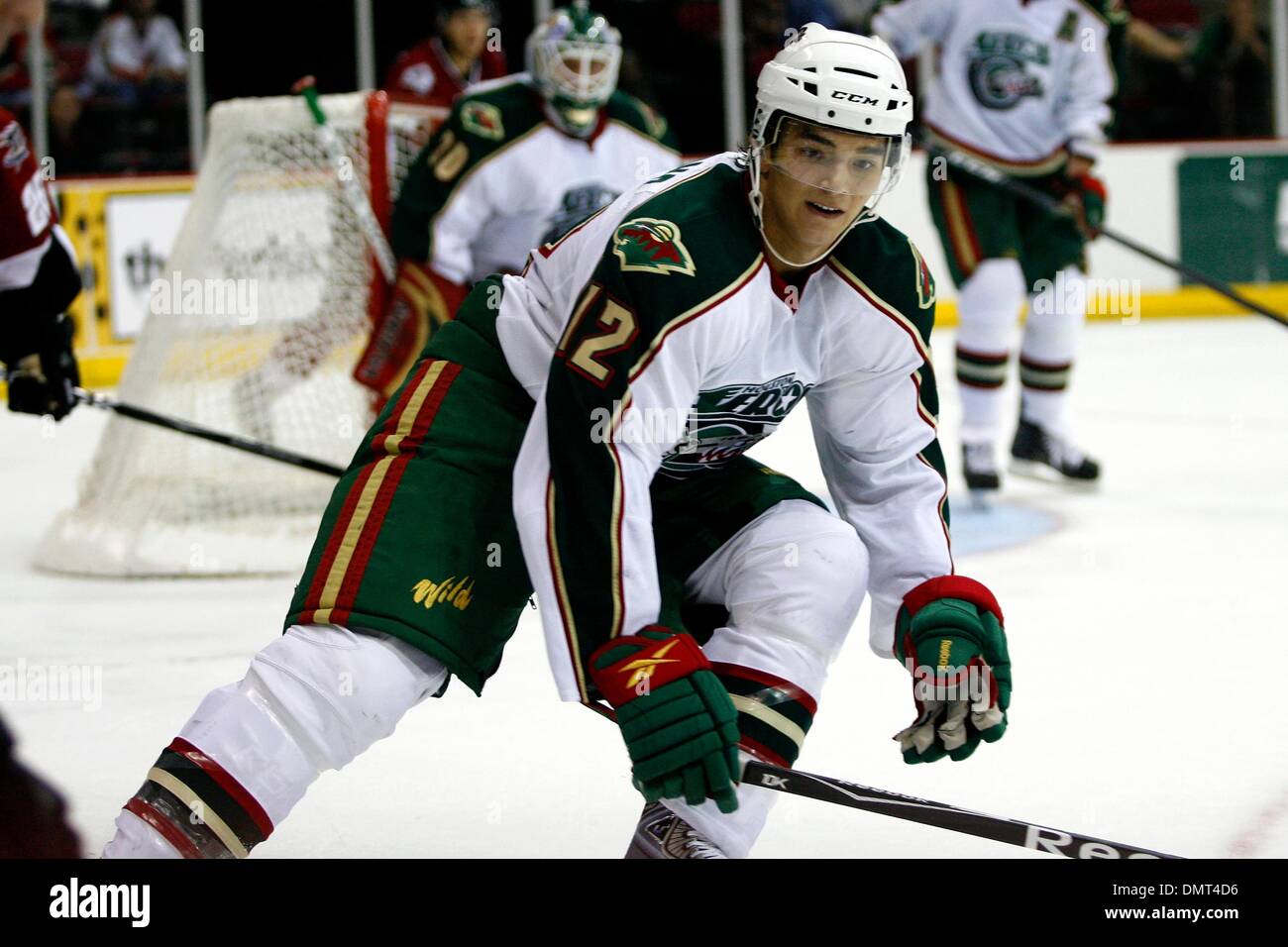 Houston Aeros right winger Craig Weller (12) defending as the Monsters ...