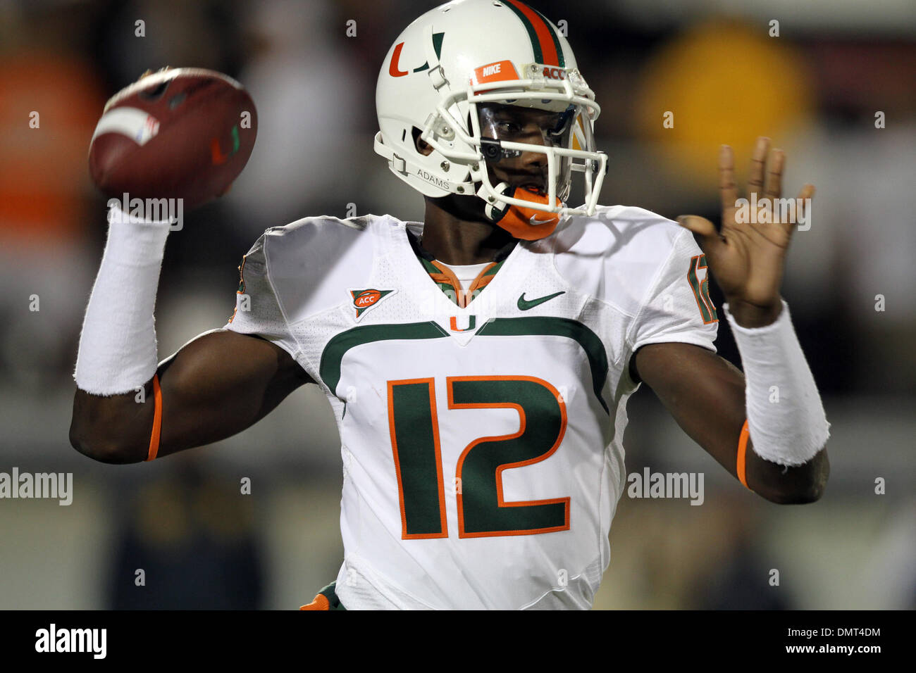 Miami (FL) quarterback Jacory Harris (12) completes a pass down field ...