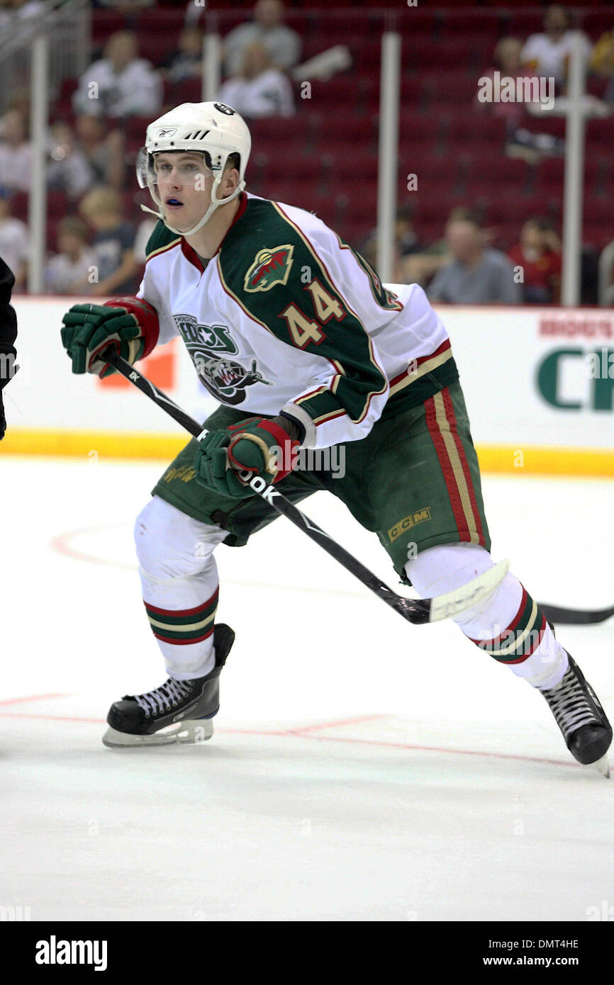 Aeros defenseman Justin Falk (44) focuses on the Rampage skater as he ...