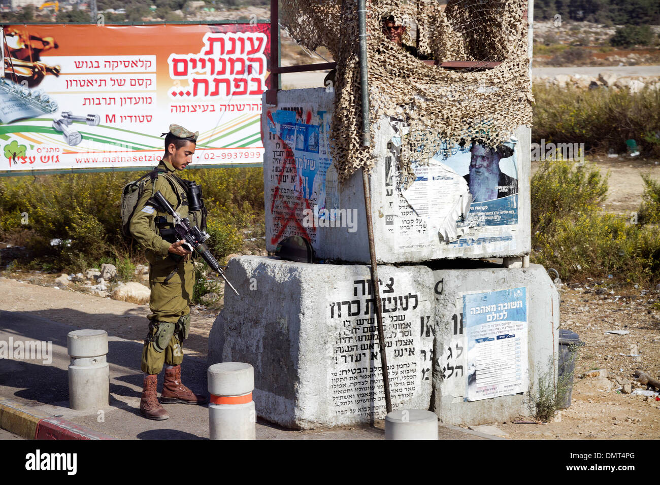 IDF guard at checkpoint in the Palestine territories behind the Israeli ...