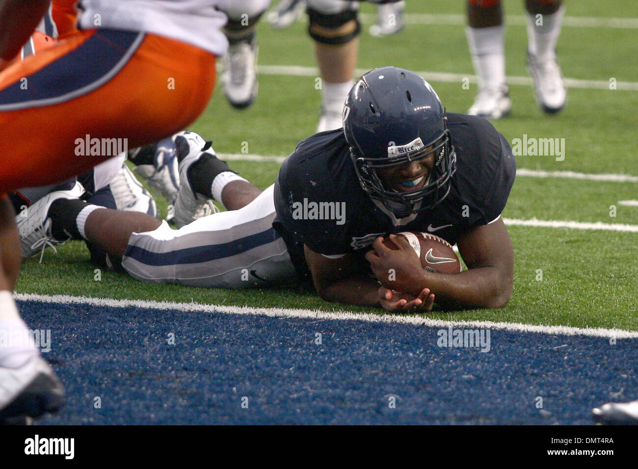 Rice running back Tyler Smith (37) gets tackled just short of the goal ...