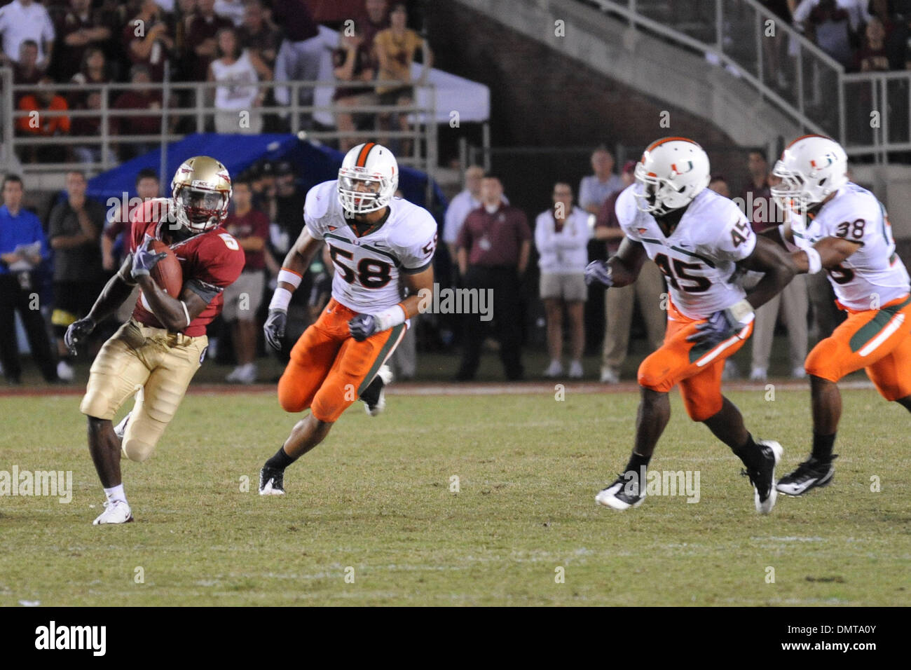 Florida State return man, Greg Reid, returns a punt during Monday ...