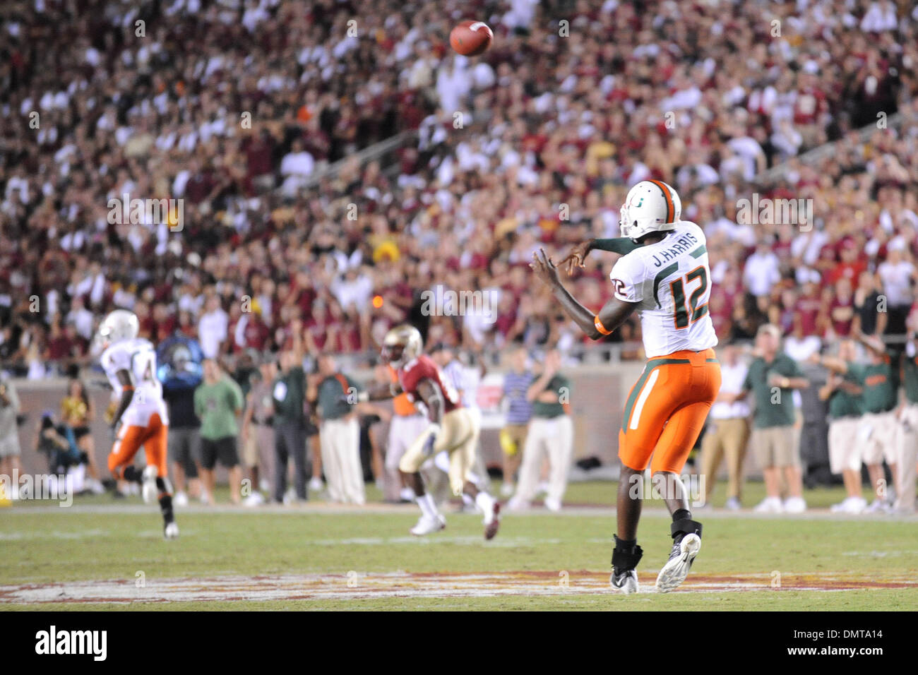 Miami quarterback, Jacory Harris, completes a pass during Monday nights ...