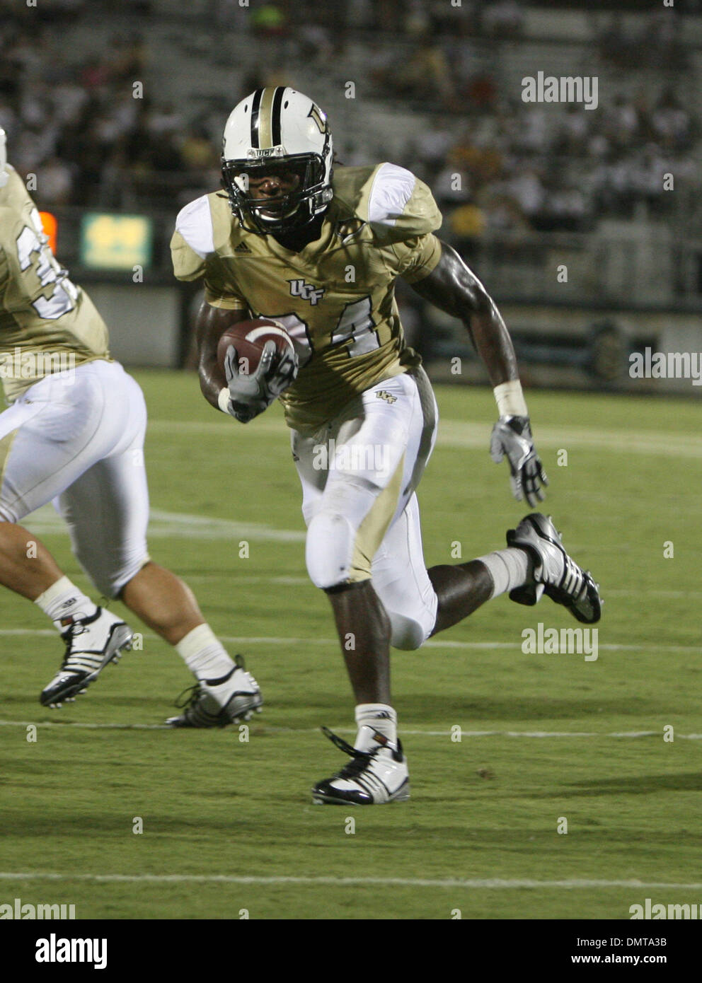UCF running back Brynn Harvey (34) rushes for a first quarter touchdown ...