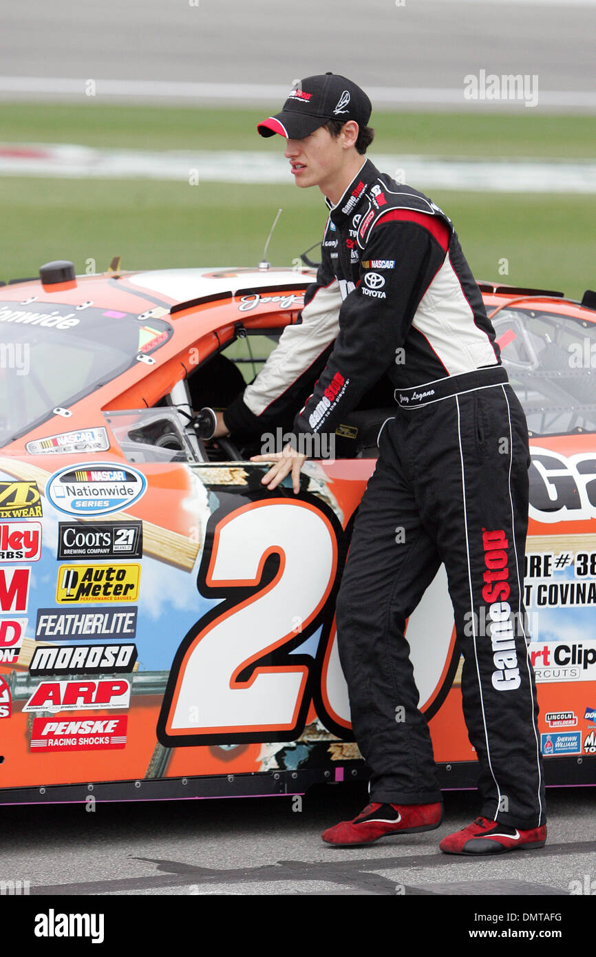 Nationwide Series driver Joey Logano #20 helps push his car during ...