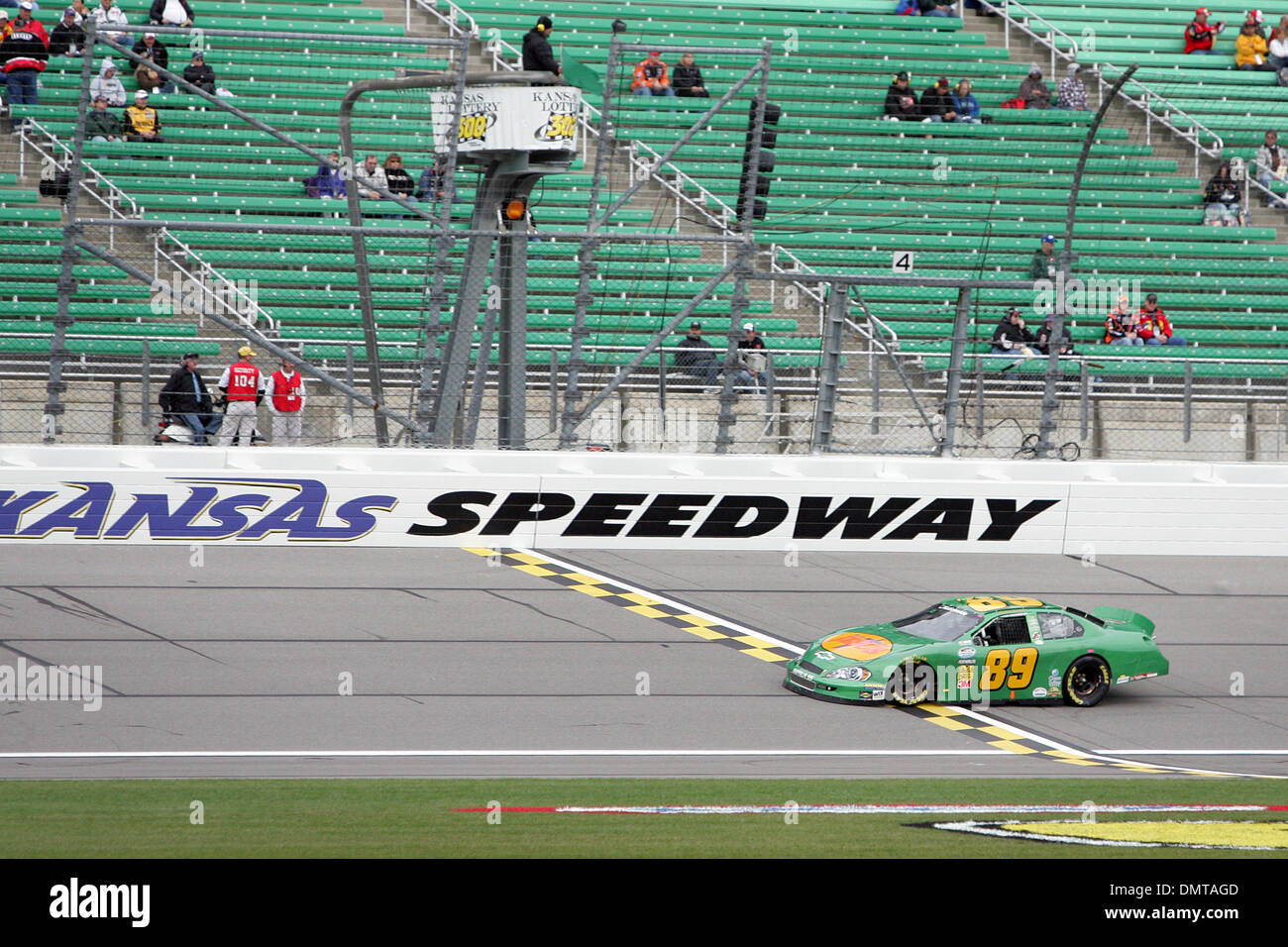 Nationwide Series driver Morgan Shepherd #89 crosses the finish line ...