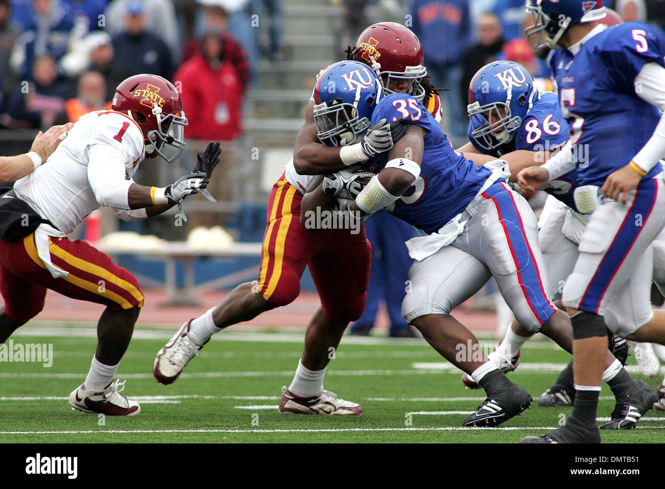 Kansas running back Toben Opurum (35) pushes forward against Iowa State ...