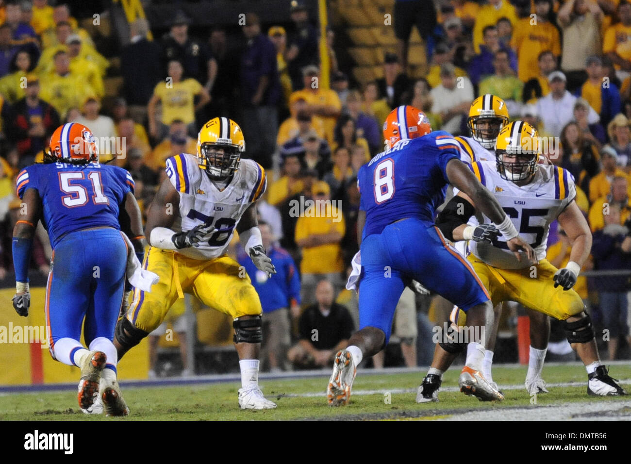 Florida linebacker #51, Brandon Spikes, and florida defensive end #8 ...