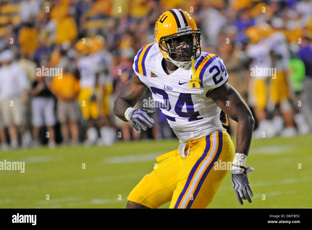LSU linebacker #24, Harry Coleman, goes through pre-game drills prior ...