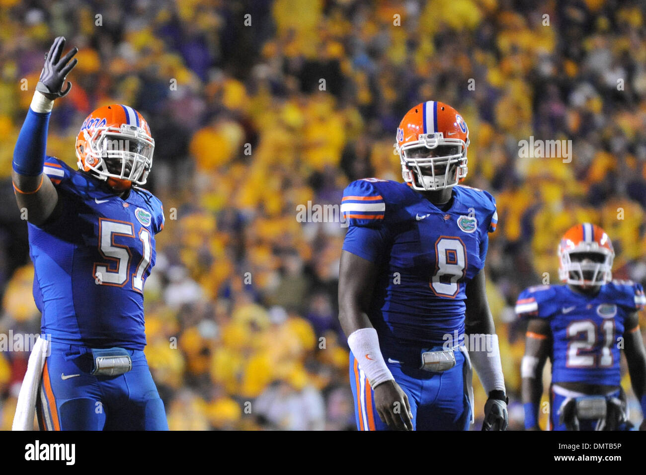 Florida linebacker #51, Brandon Spikes, signals to the LSU crowd during ...