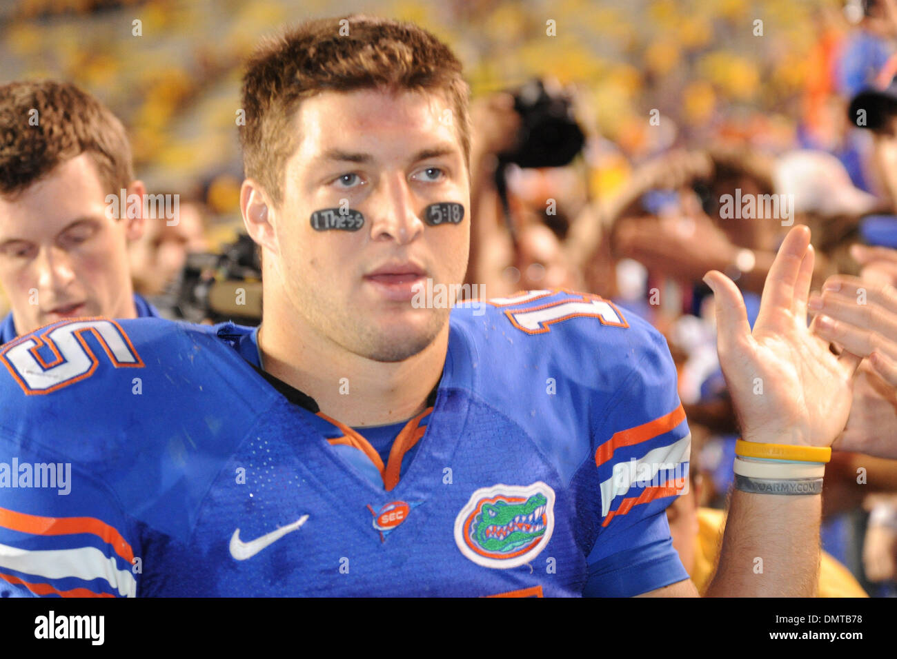 Florida quarterback, #15 Tim Tebow, greets fans after Saturday nights ...
