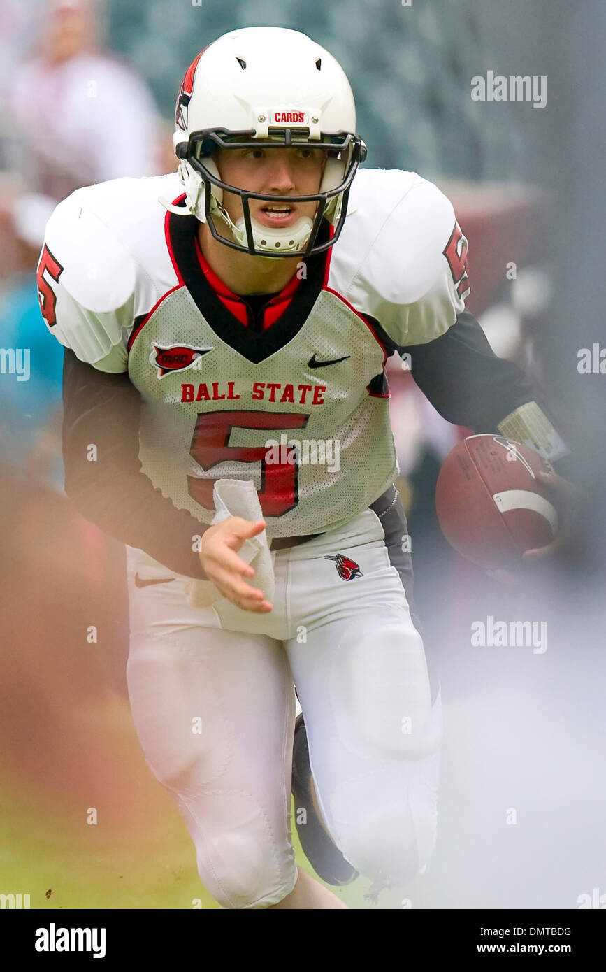 Ball State Cardinals quarterback Kelly Page (5) scrambling with the ...