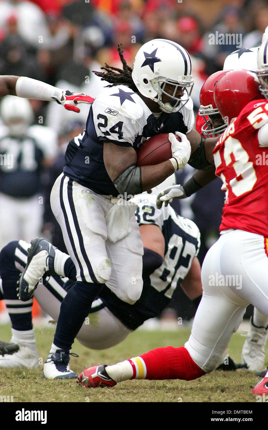 Dallas Cowboys running back Marion Barber scrambles for yardage during ...
