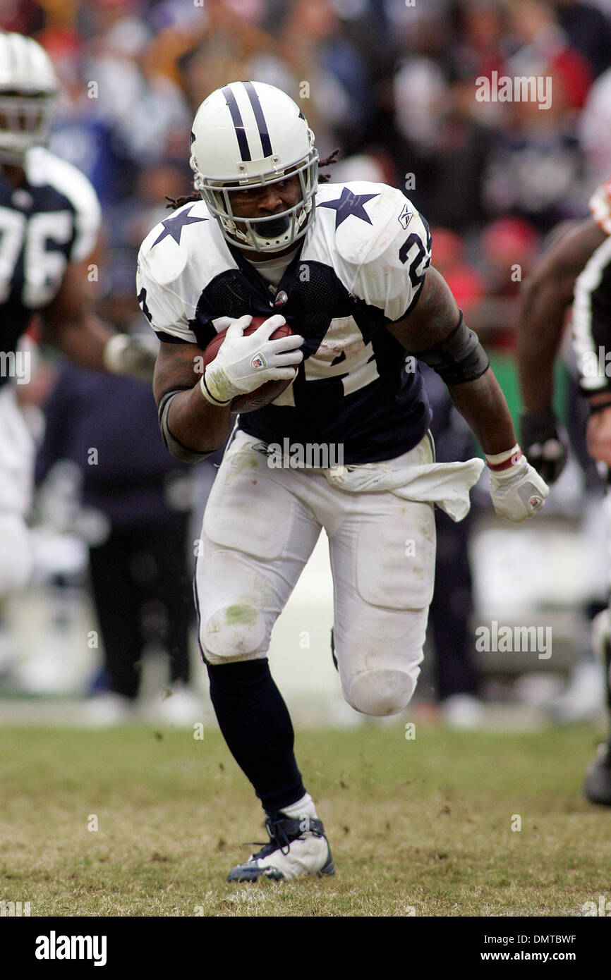 Dallas Cowboys running back Marion Barber (24) scrambles for yardage ...
